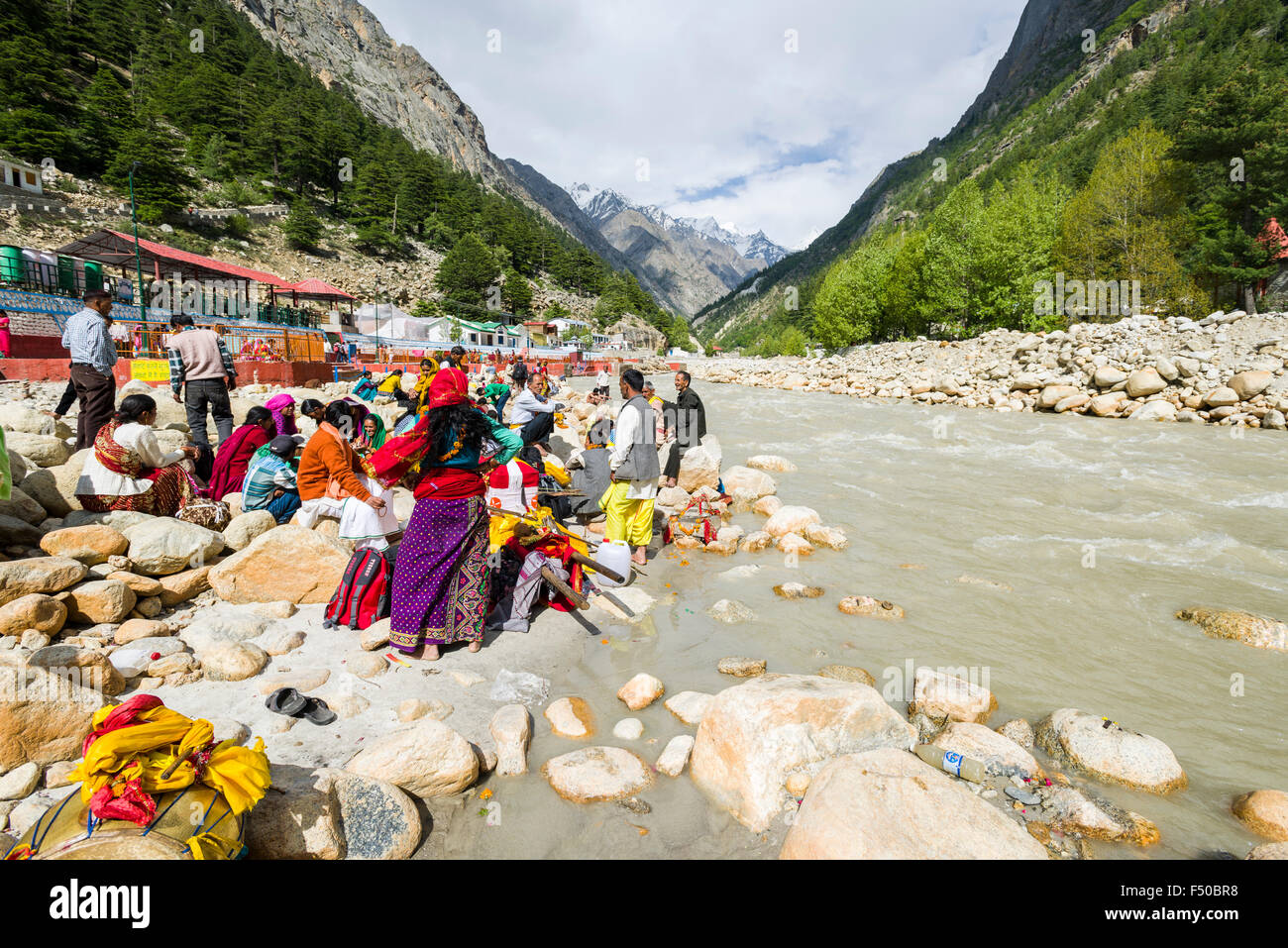Pilgrims from all over India come to the banks of the river Ganges to ...