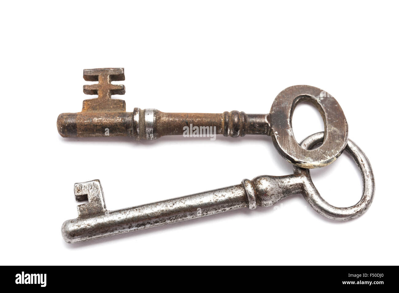 Old keys isolated on white Stock Photo - Alamy