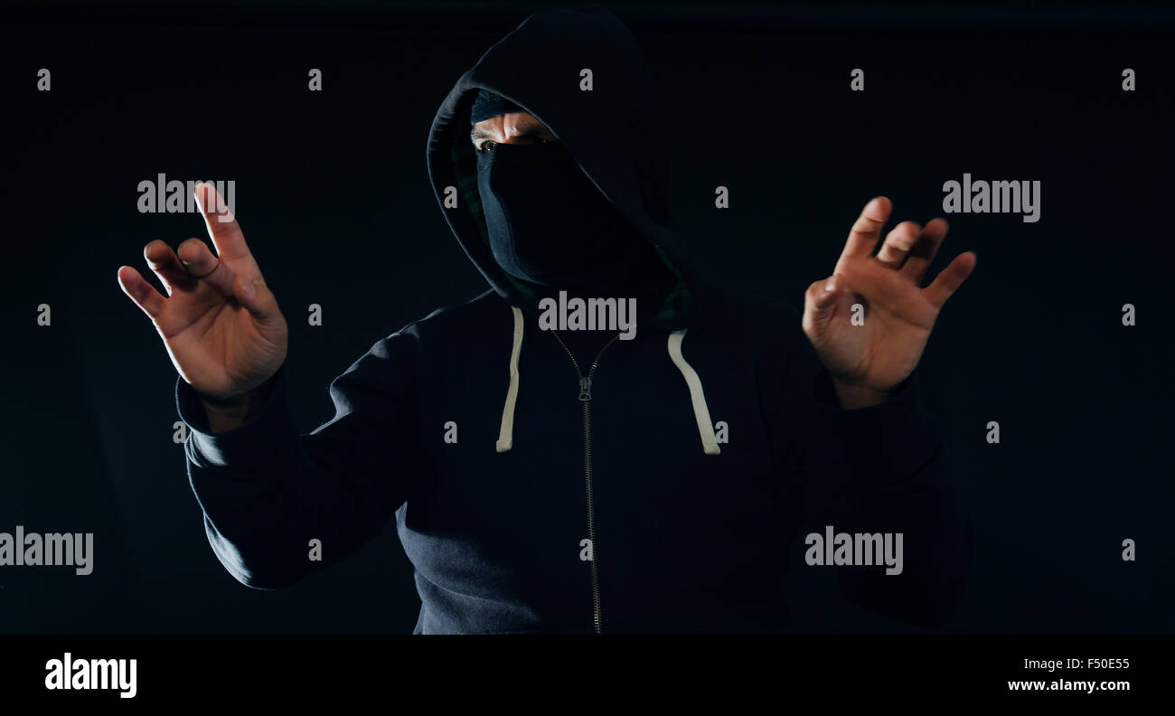 Futuristic hacker in black Stock Photo - Alamy