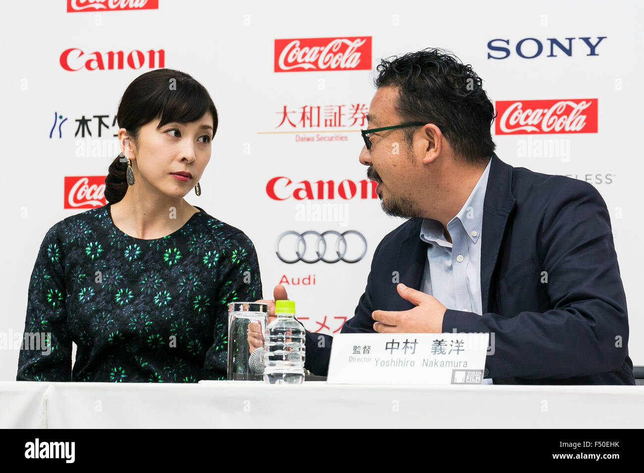 (L to R) Actress Yuko Takeuchi speaks with the director Yoshihiro ...