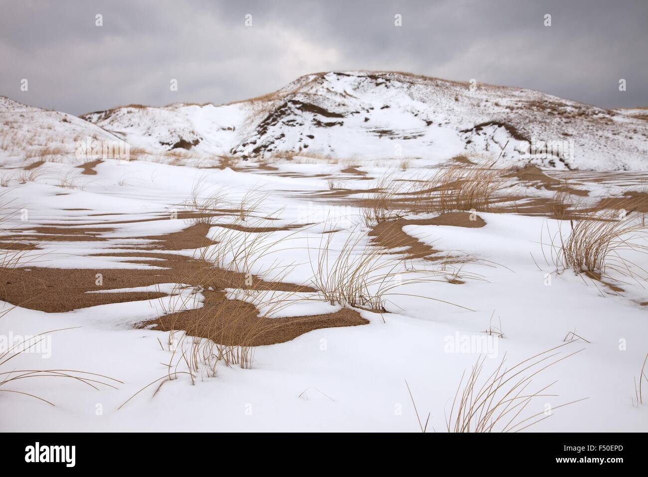 Sand Dunes With Snow Stock Photo - Alamy