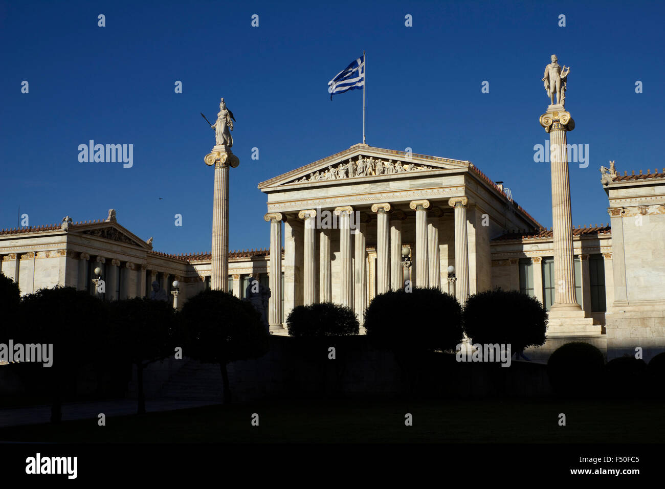 Wide view of the Academy of Athens building and statues of Athens (left ...