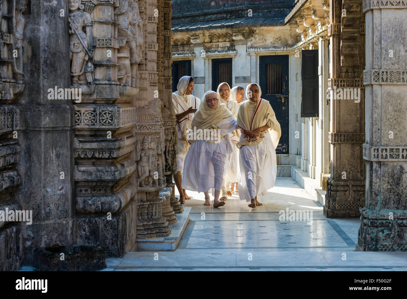 A group of Jain nuns is visiting a temple at Shatrunjaya hill, one of ...