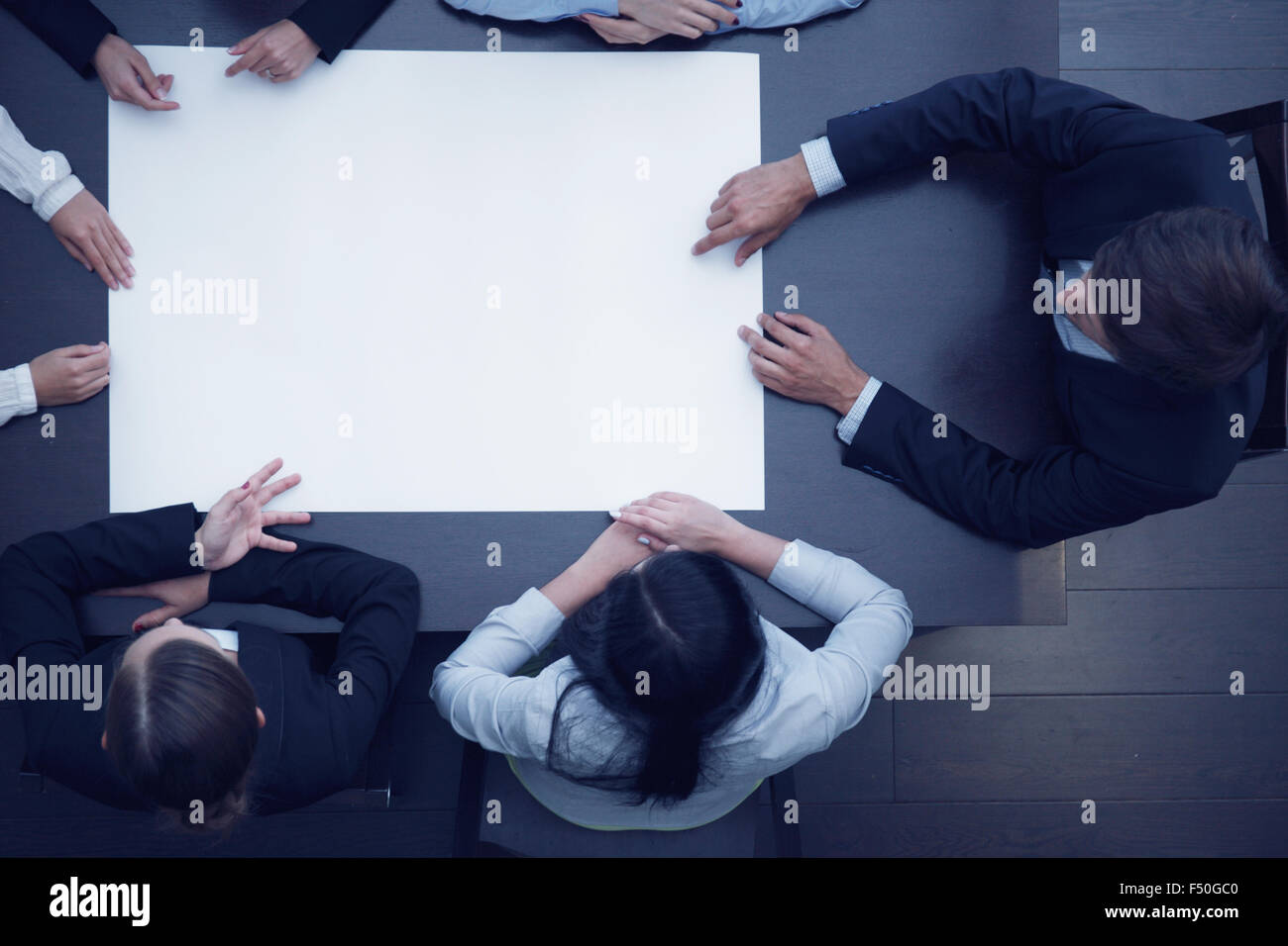 Group of business people with blank paper, new project concept Stock ...