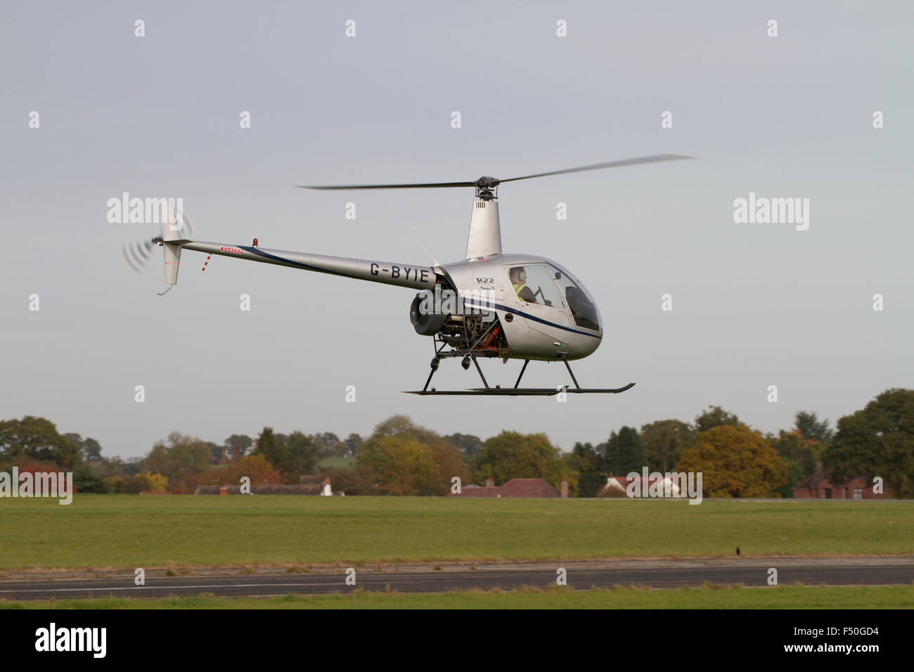 Helicopter small flying hovering hi-res stock photography and images ...