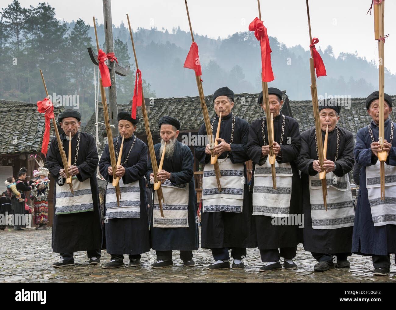 The Lusheng payers, Miao men in traditional attire, Langde Shang Miao ...