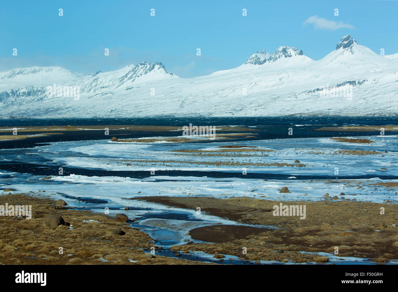 Snow-covered volcanic mountain landscape in Iceland Stock Photo - Alamy