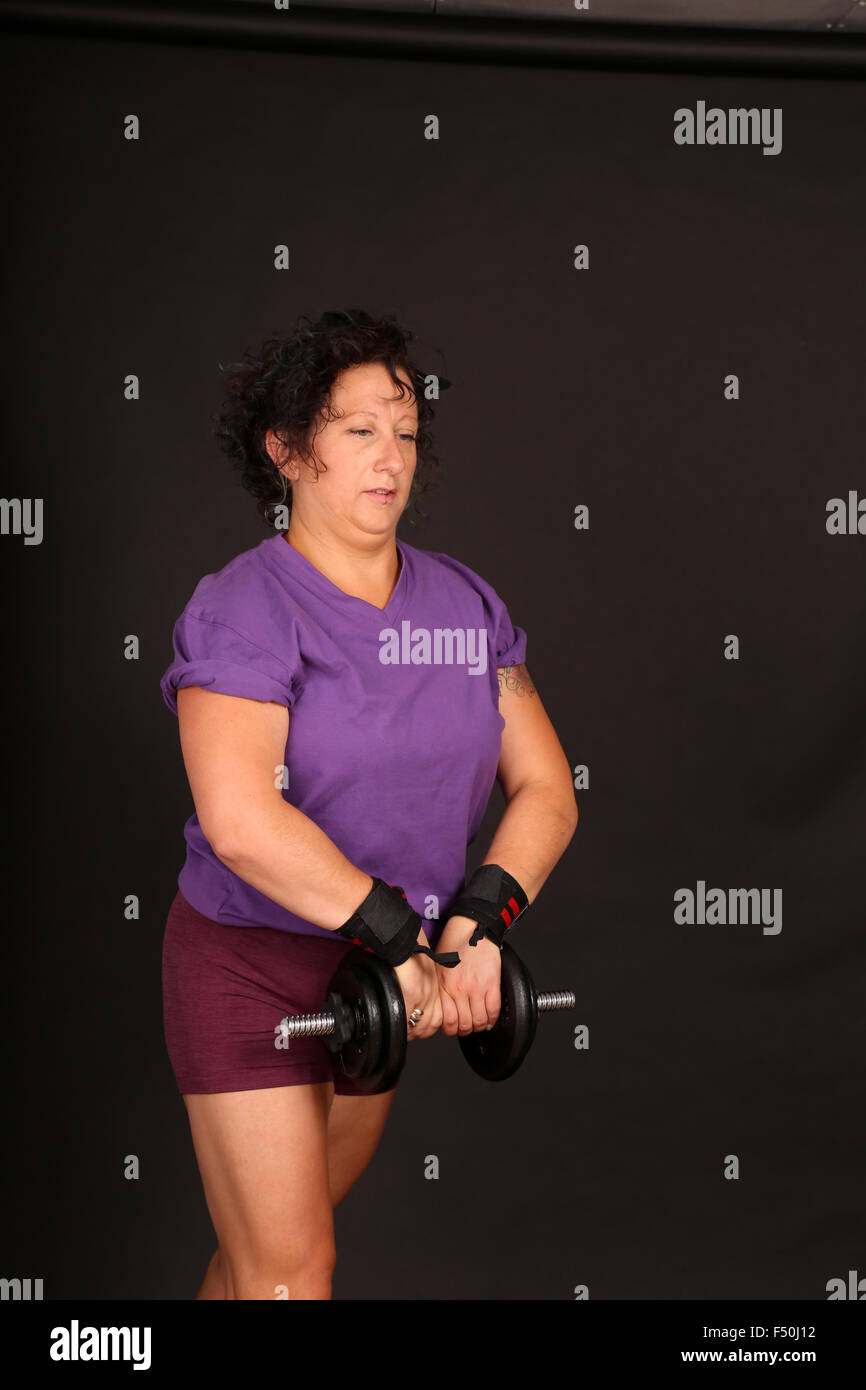 Mature female boxer exercising with weights, September 2015 Stock Photo ...