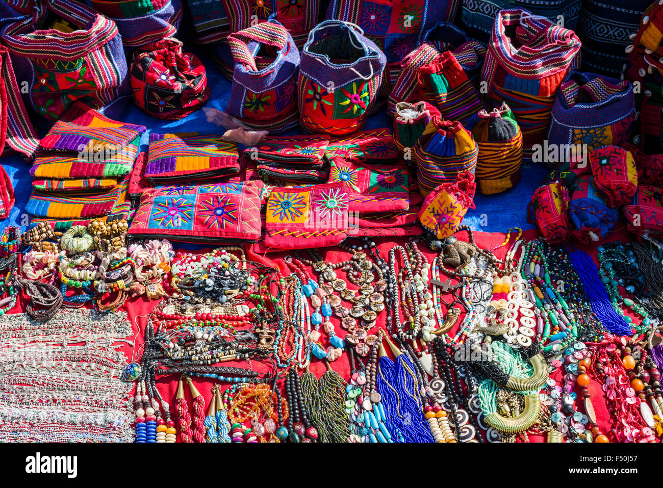 Many different goods like artfully designed bags and colorful jewellery ...