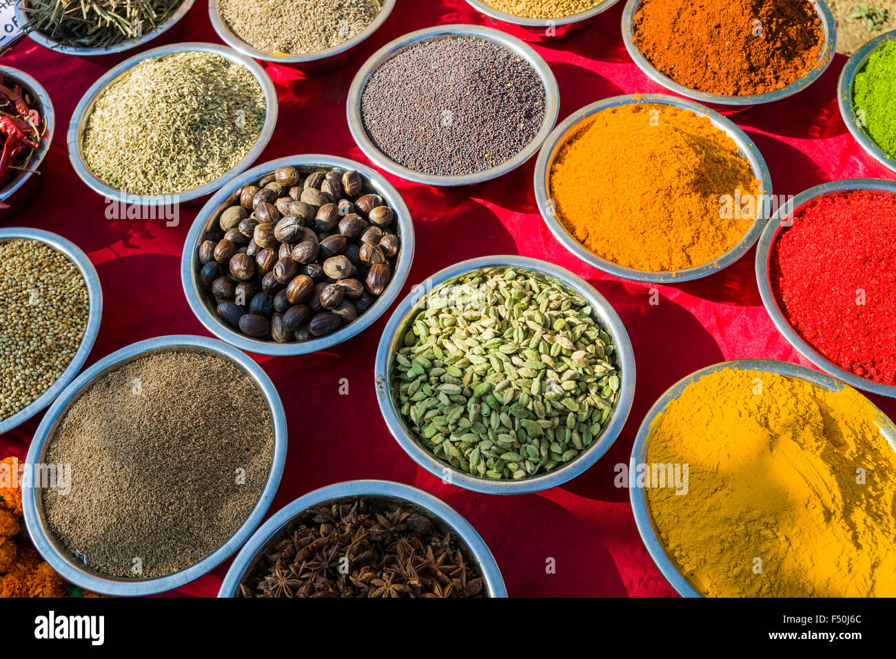 Many different goods like typical indian spices and curries are ...