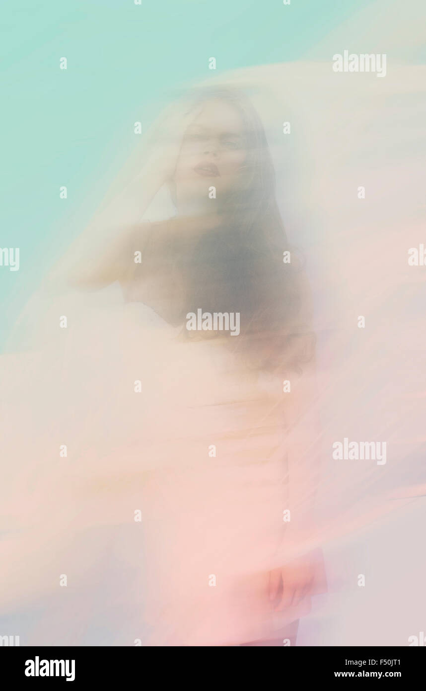 Woman blurred by movement Stock Photo - Alamy