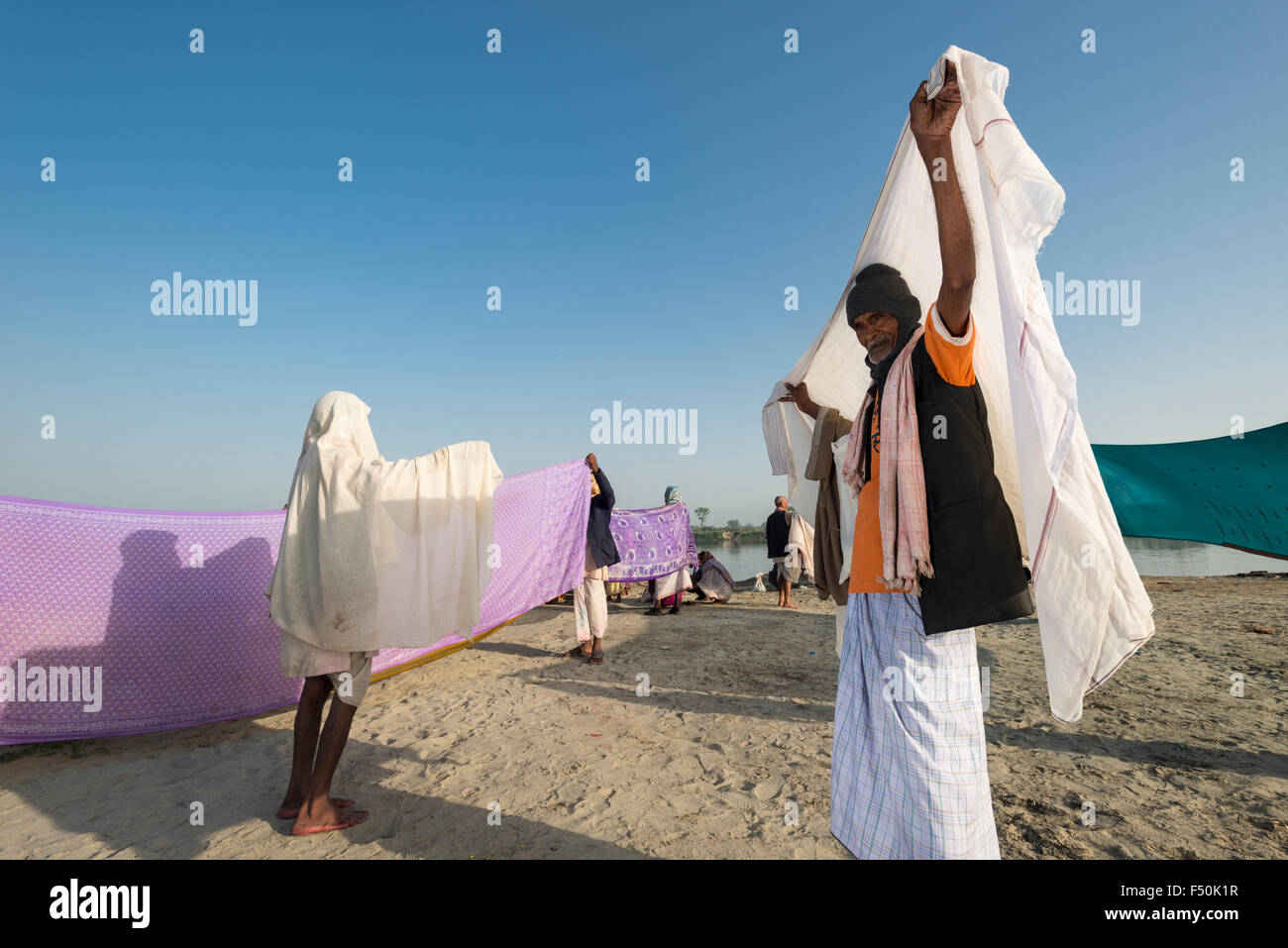 Women wash clothes bath river hi-res stock photography and images - Alamy