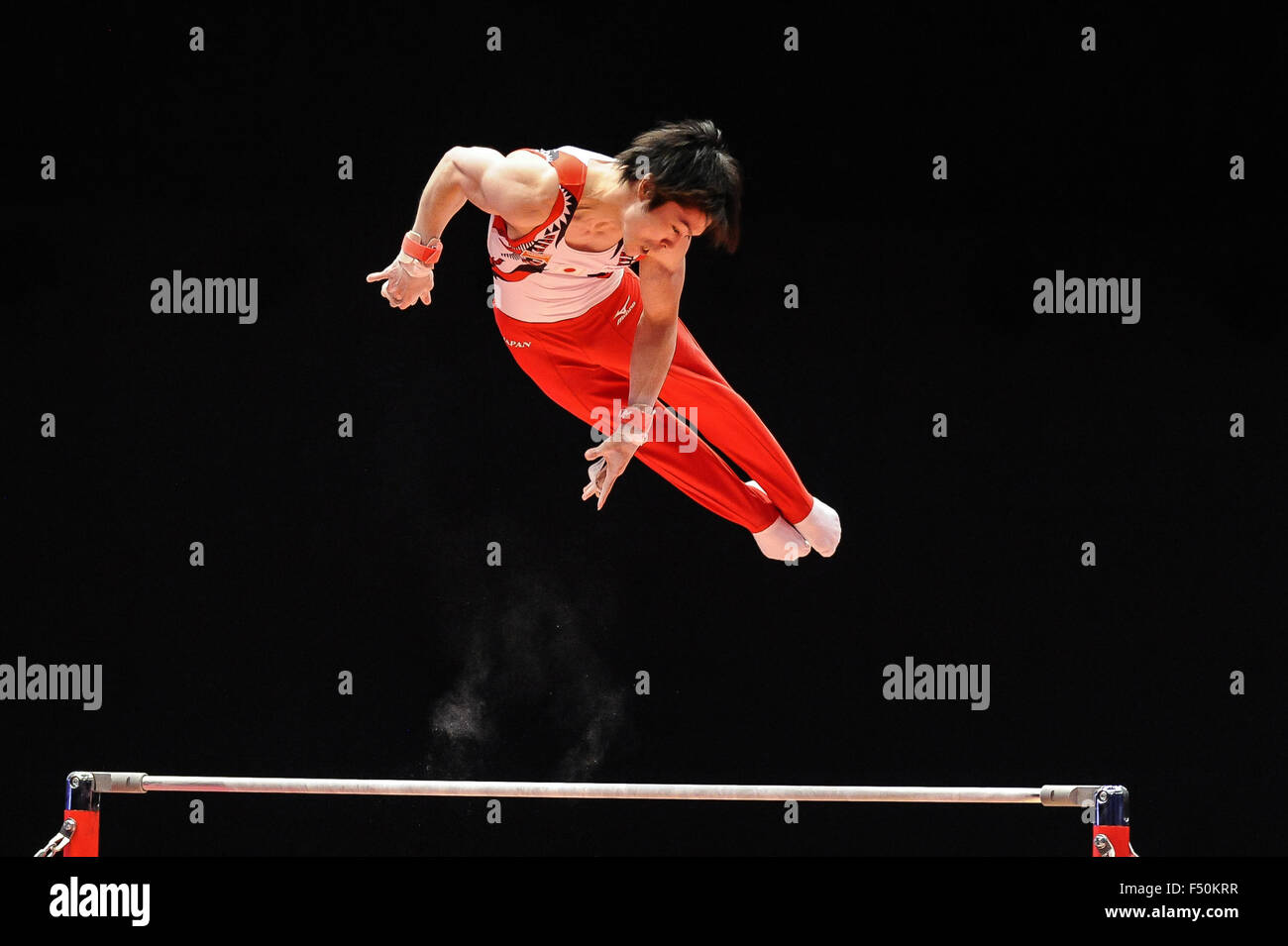 KOHEI UCHIMURA from Japan competes on the high bar during the ...