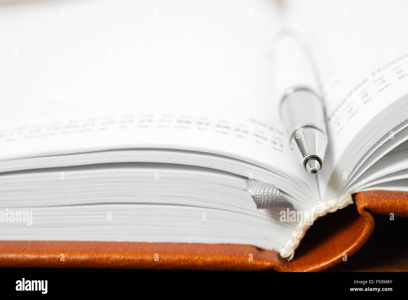 Open notebook and pen for writing Stock Photo - Alamy