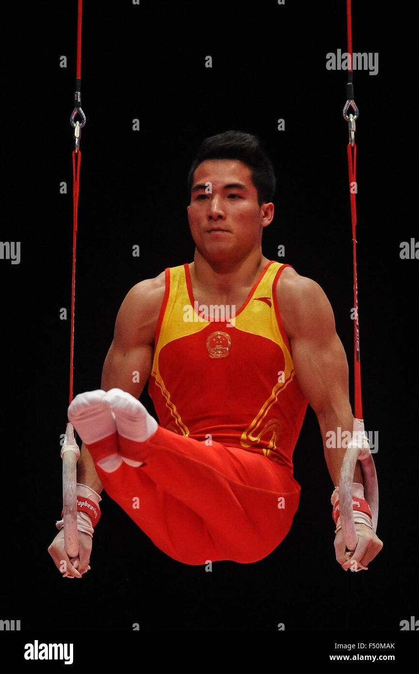 SHUDI DENG from China competes on the rings during the preliminary ...
