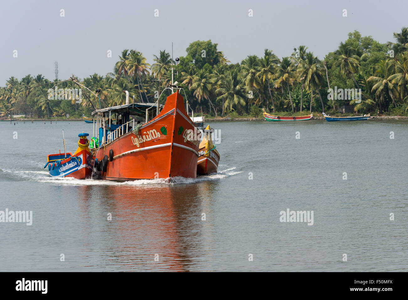 Orange fishing boat hi-res stock photography and images - Alamy