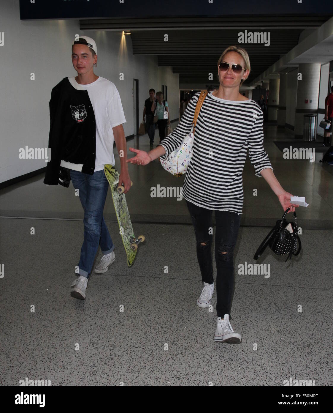 Amber Valletta and son Auden at Los Angeles International Airport (LAX ...