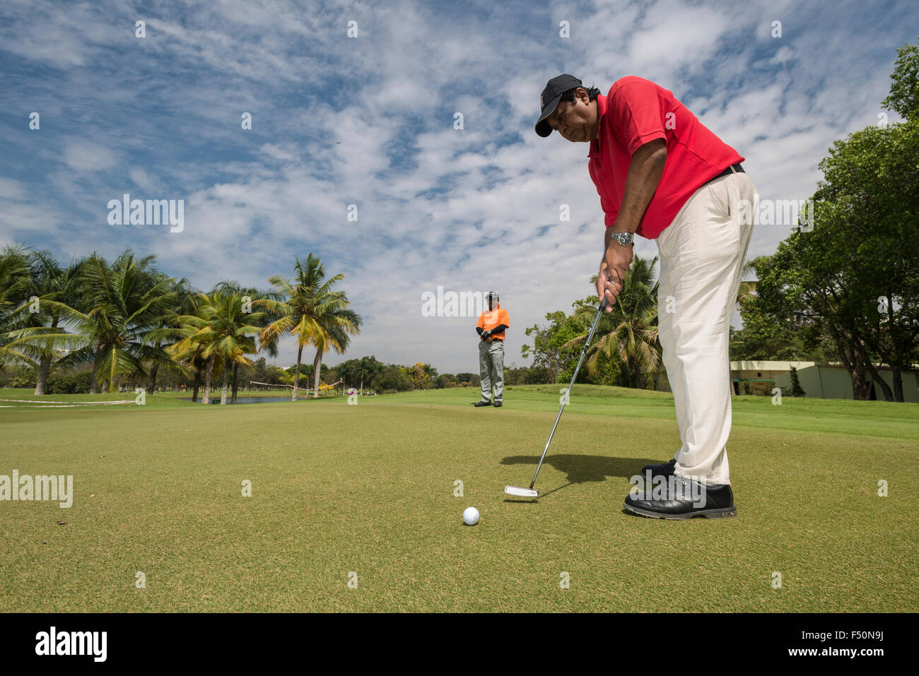 Members of the Karnataka Golf Association are playing at the golf ...