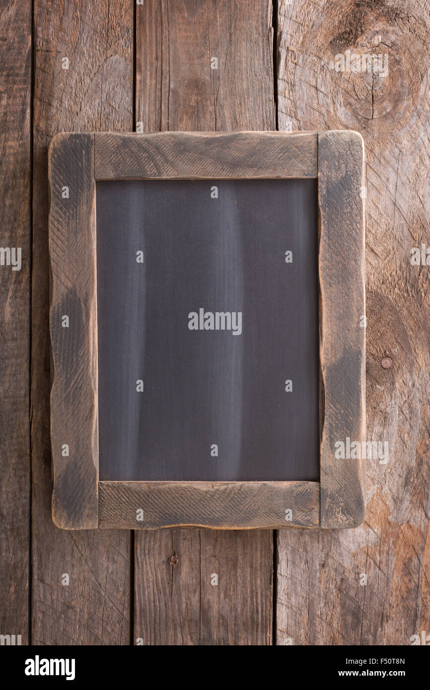 Wooden rustic background with a rustic chalkboard Stock Photo - Alamy
