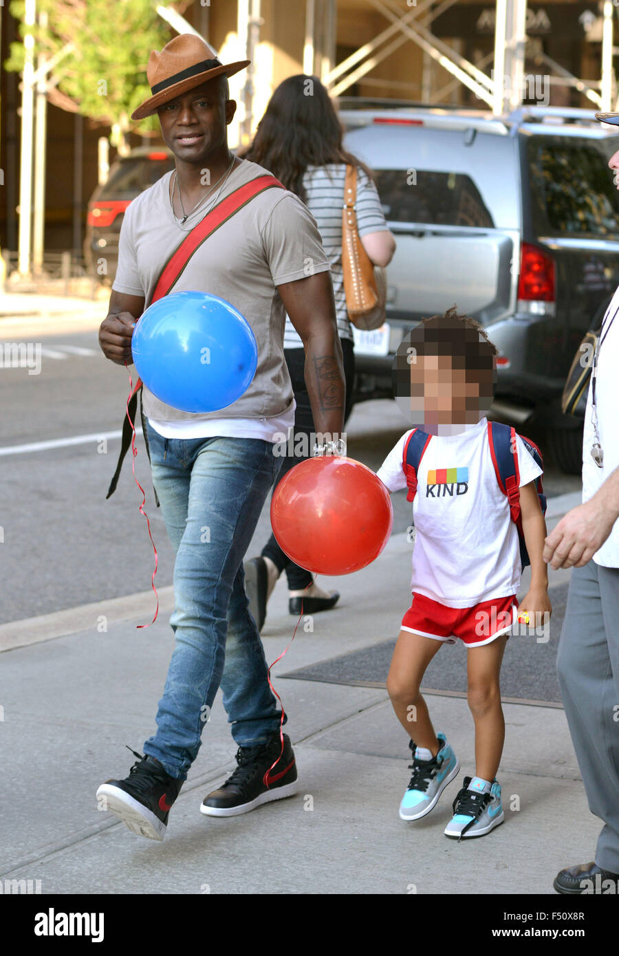 Taye Diggs and his son Walker, out and about in Manhattan catching the ...