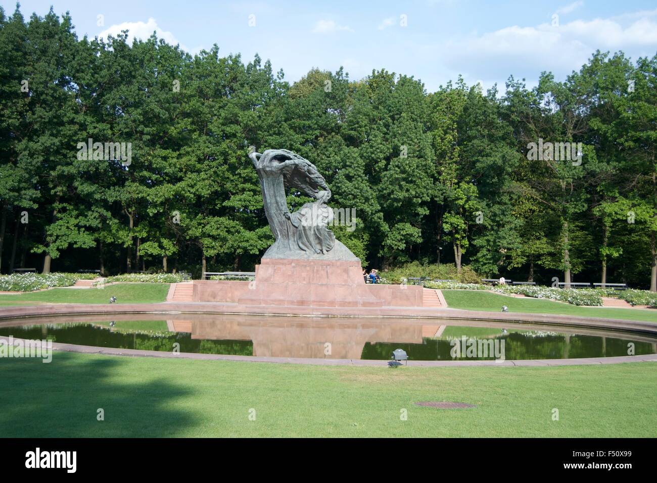 Lazienki park Chopin Frederik memorial monument Stock Photo - Alamy
