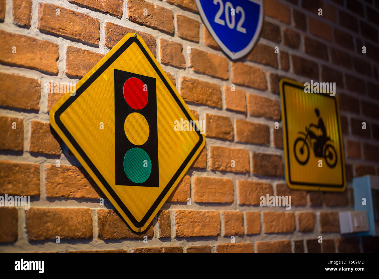 traffic sign on the wall of motorcycle shop Stock Photo - Alamy