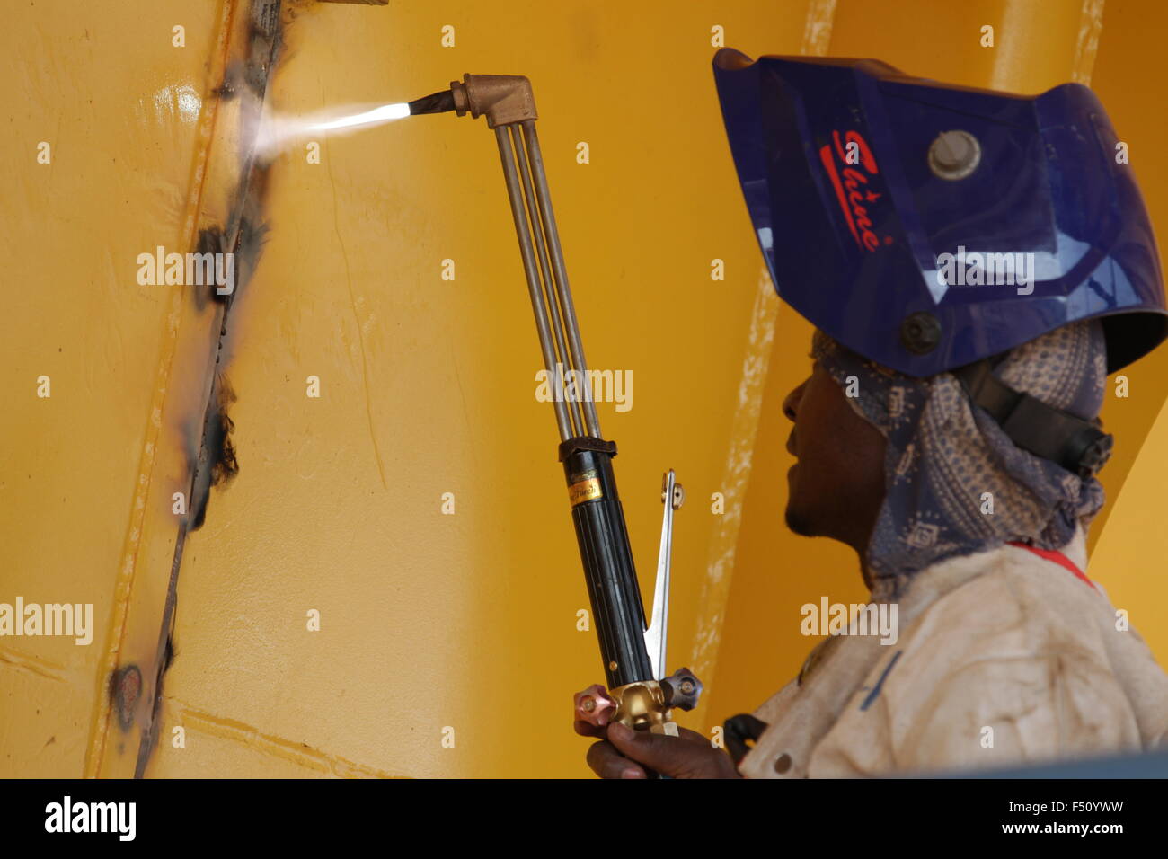 Welder heating metal. FQM Copper mining operations in Zambia, Africa ...