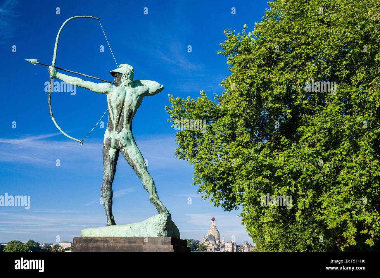 The Archer, a sculpture closed to the river Elbe, Church of our Lady in ...
