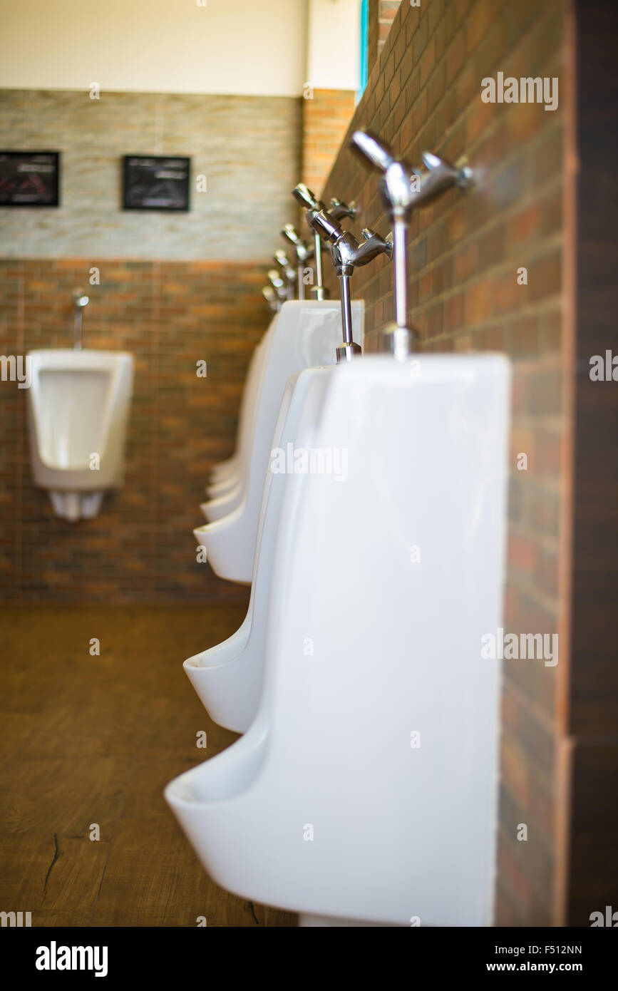 Urinal in the toilet of a restaurant Stock Photo - Alamy