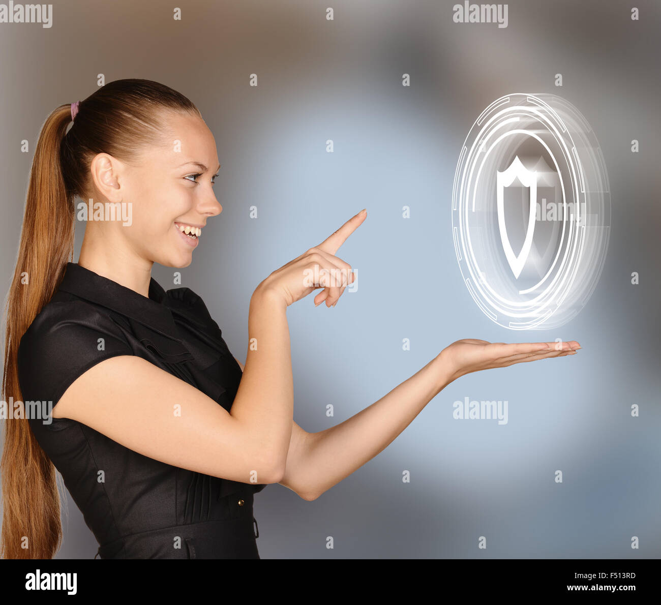 Girl touches forefinger in white shield sign Stock Photo - Alamy