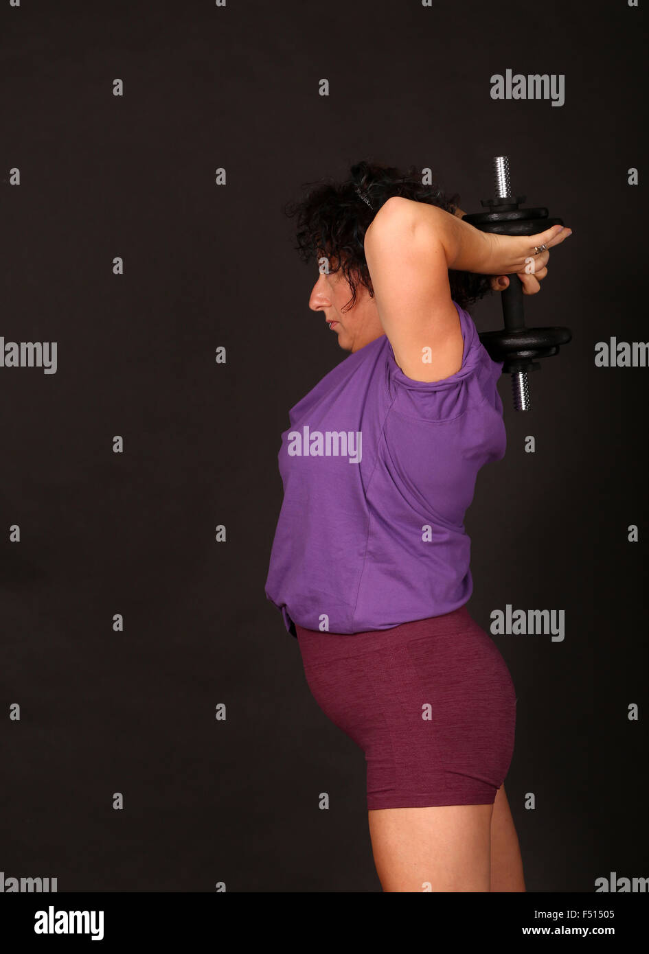 Mature female boxer exercising with weights, September 2015 Stock Photo ...