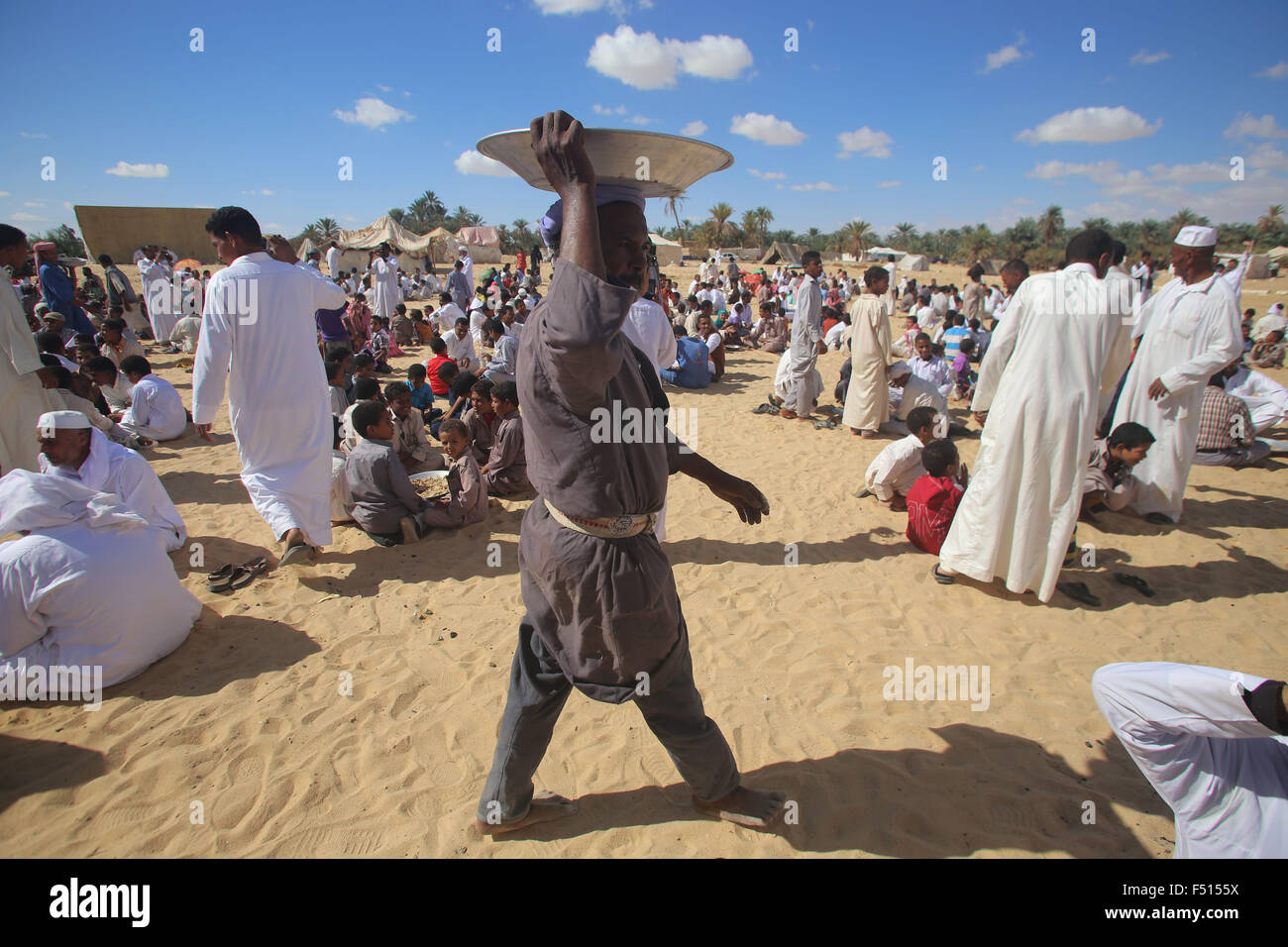 Siwa, Egypt. 25th Oct, 2015. An Egyptian man prepares food for the ...