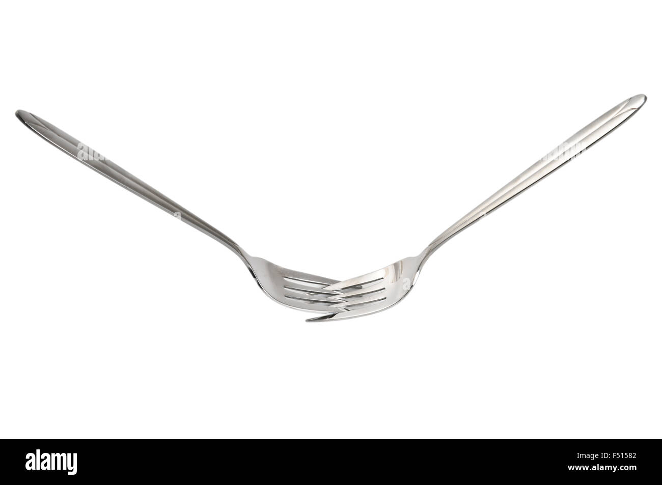 Interlocked fork Cut Out Stock Images & Pictures - Alamy