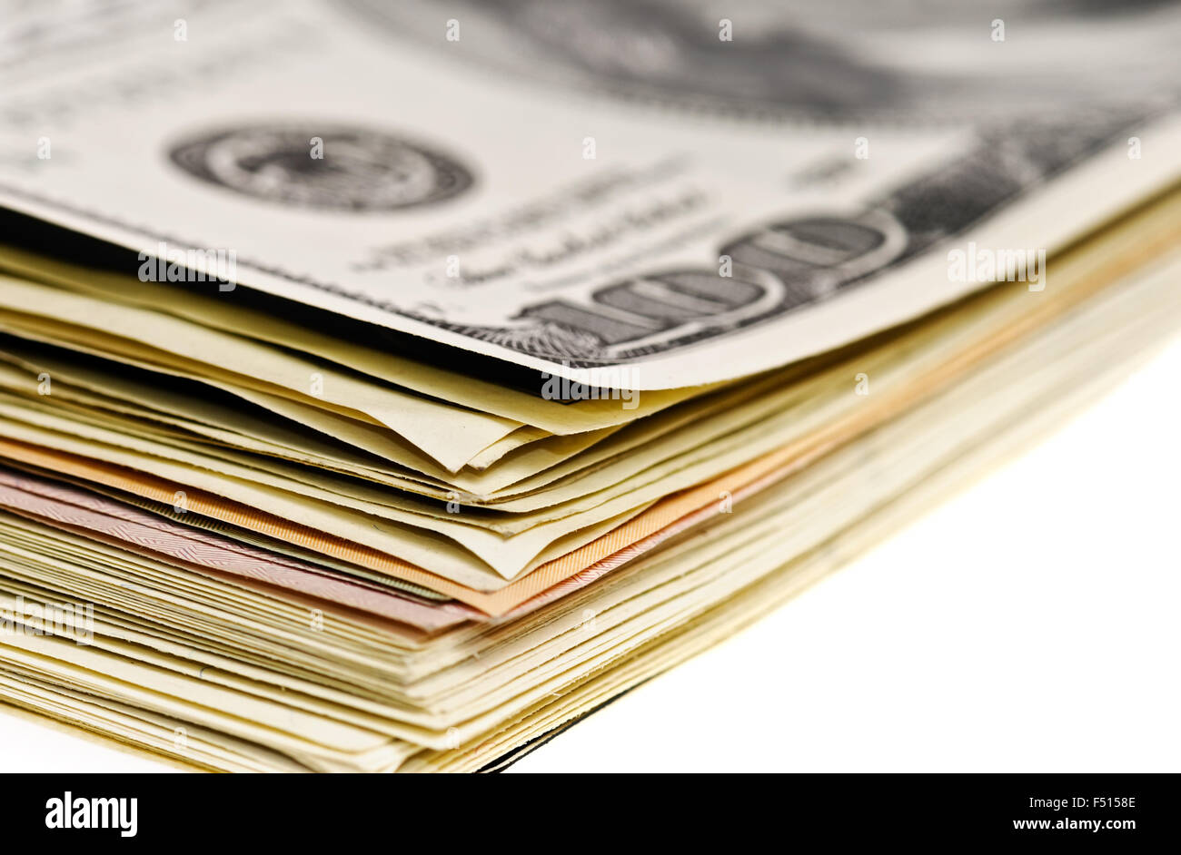stack of dollar banknotes macro view isolated on white Stock Photo - Alamy