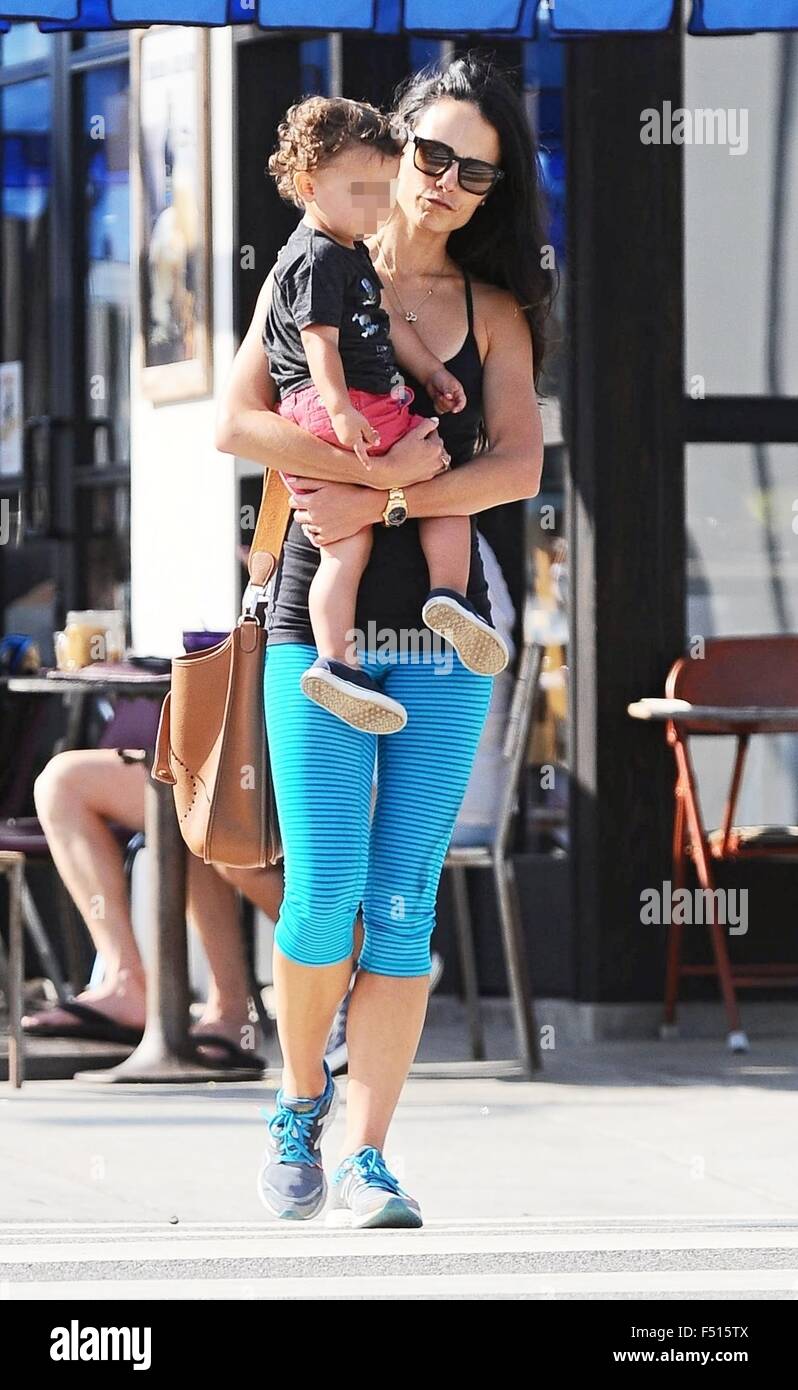 Jordana Brewster carries her son Julian whilst out and about in ...