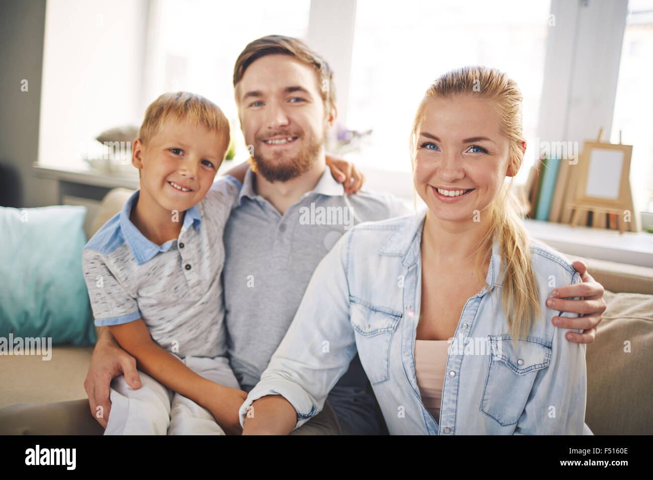 Happy parents with their cute son Stock Photo - Alamy