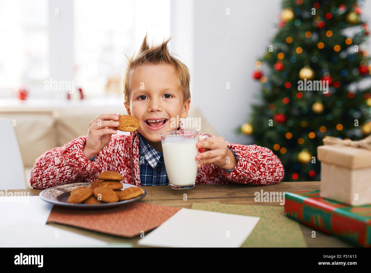 Boy eating biscuits hi-res stock photography and images - Alamy