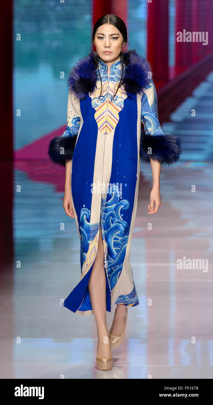 Beijing, China. 25th Oct, 2015. A model presents a Qipao (cheongsam ...