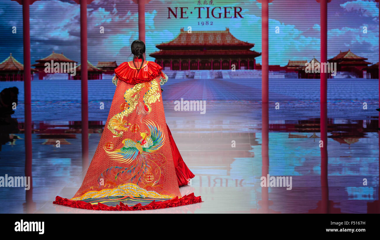 Beijing, China. 25th Oct, 2015. A model presents a Qipao (cheongsam ...