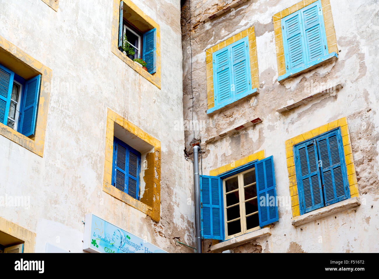 blue window in morocco africa old construction and brown wall ...