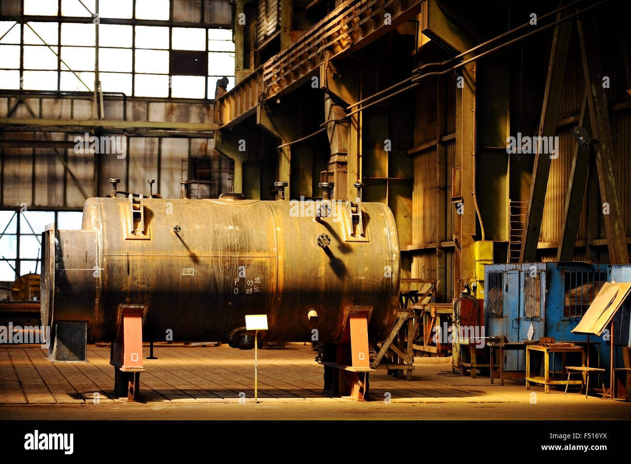 Detail shot with big industrial tank inside an old factory Stock Photo ...