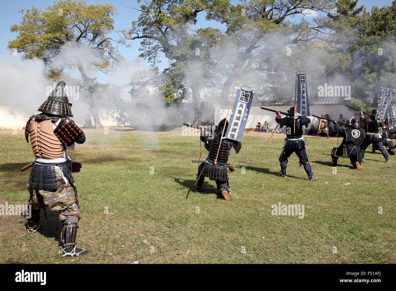 Japanese samurai with fire lock rifle Stock Photo - Alamy