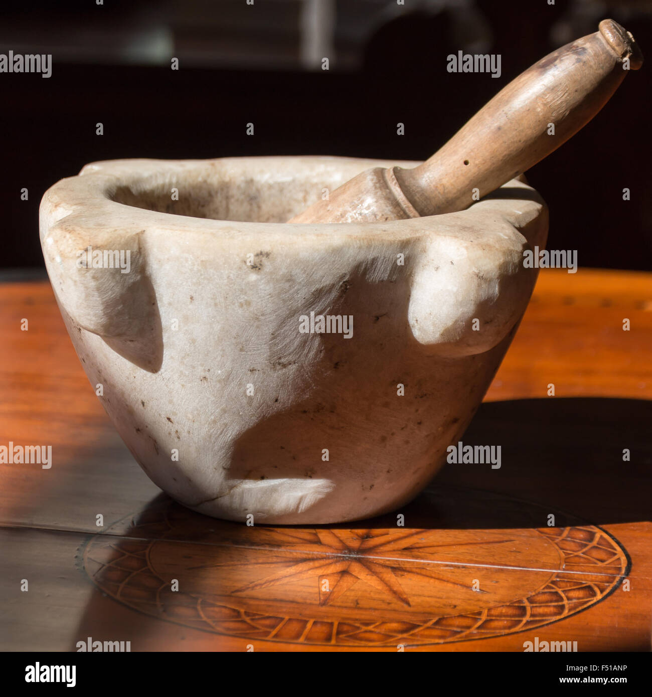 White Stone Mortar and wooden pestle Stock Photo - Alamy
