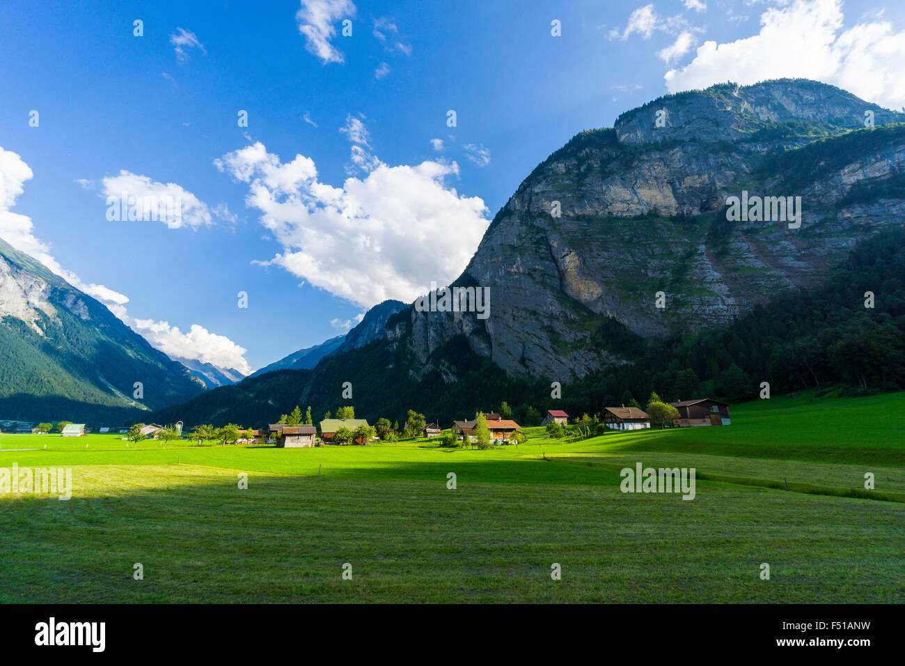 High altitude landscape with some farmers houses, mountains and green ...