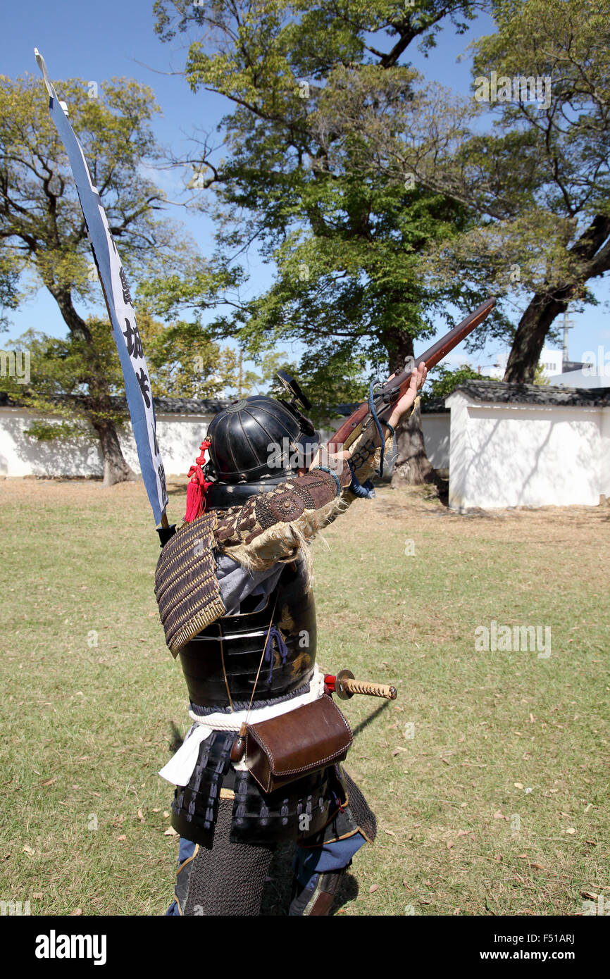 Japanese samurai with fire lock rifle Stock Photo - Alamy