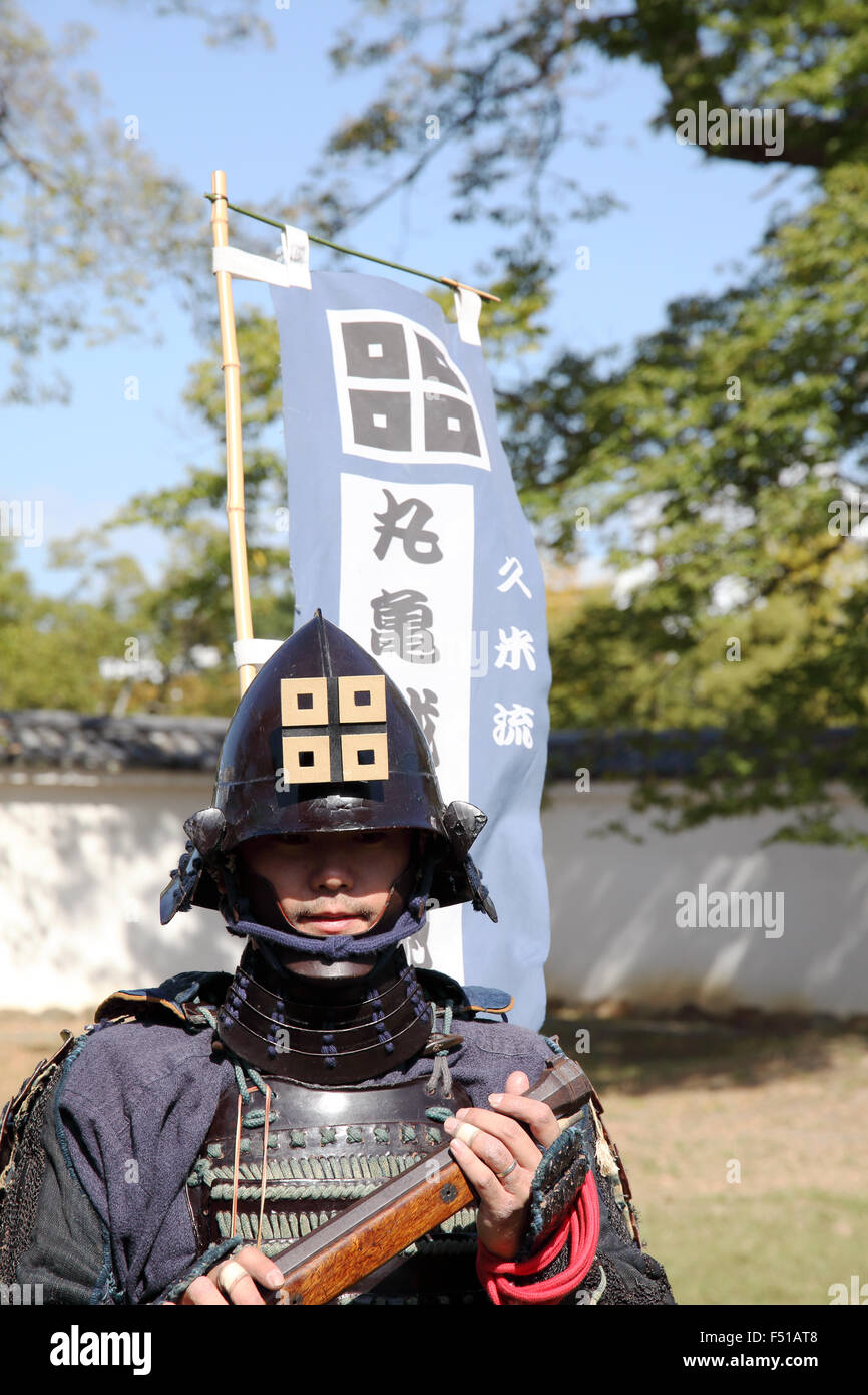 Japanese samurai with fire lock rifle Stock Photo - Alamy
