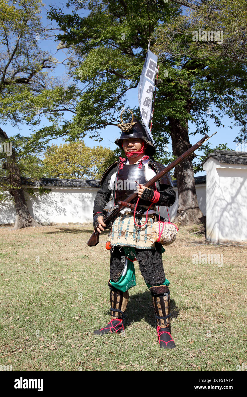 Japanese samurai with fire lock rifle Stock Photo - Alamy