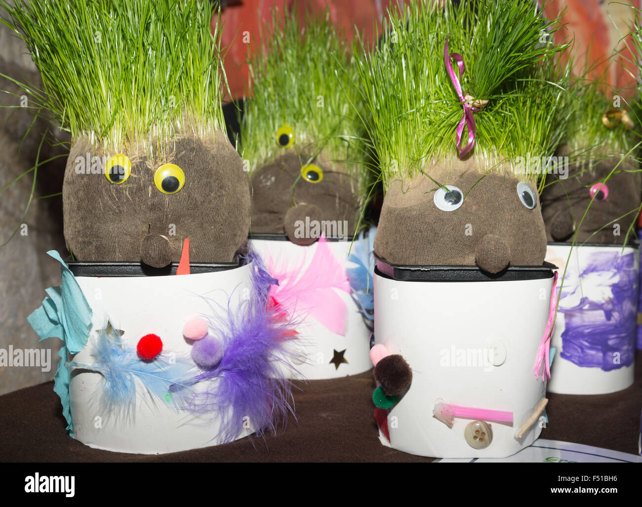 Faces with grass as hair Stock Photo - Alamy