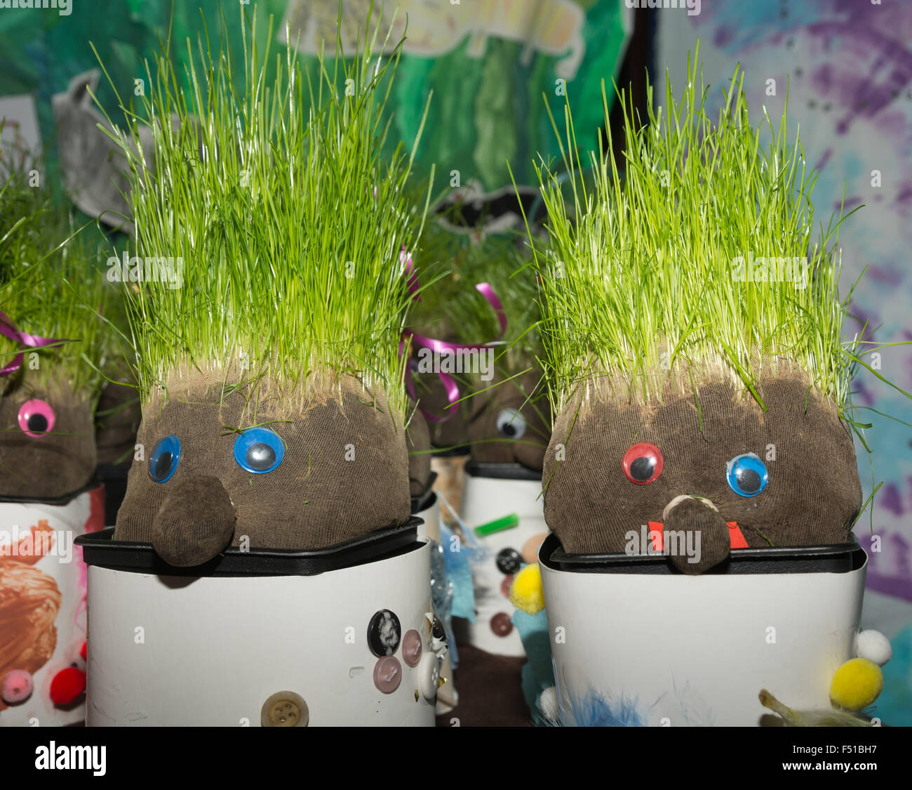 Faces with grass as hair Stock Photo - Alamy