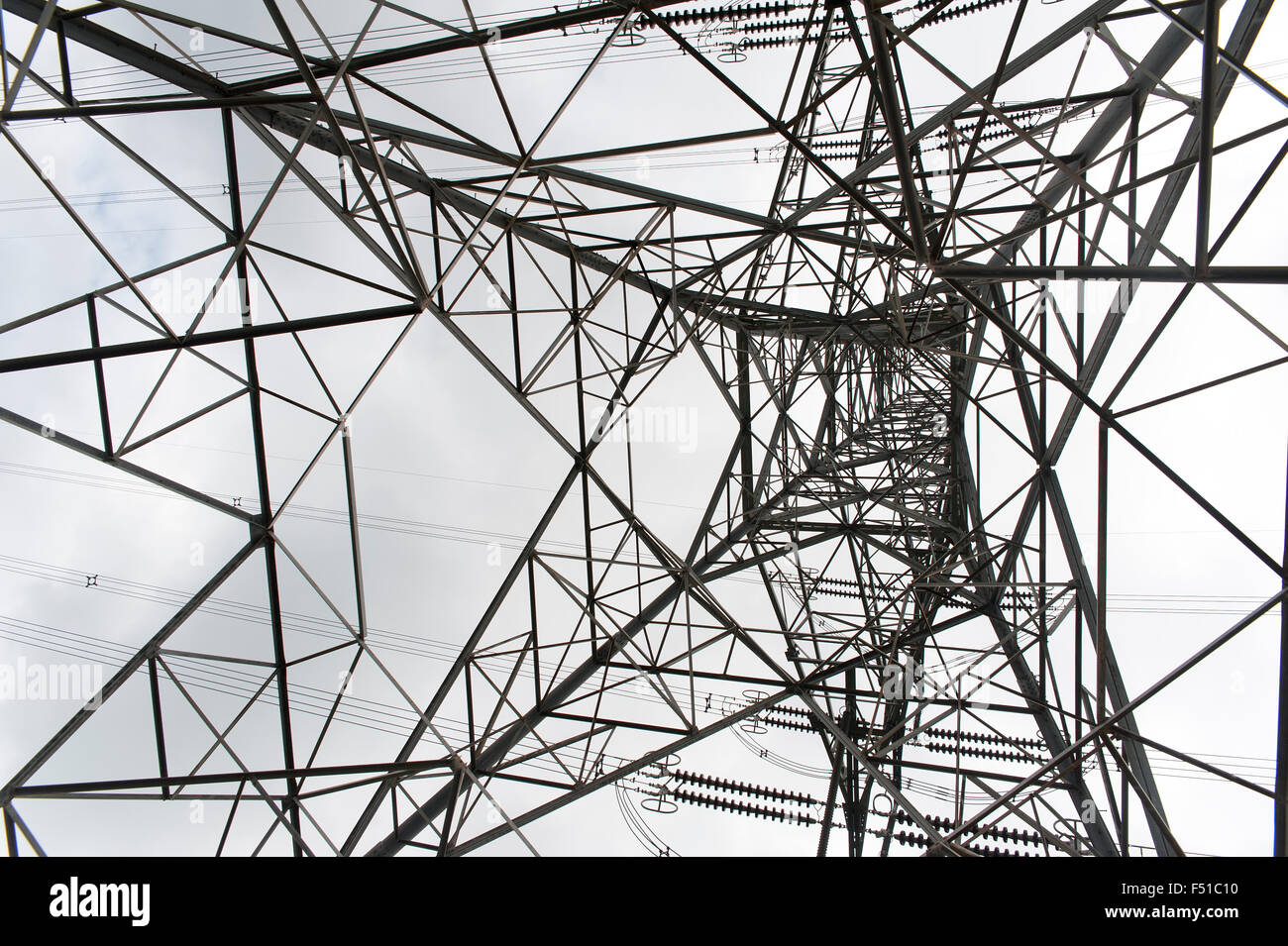 Filming electrical tower from below of it Stock Photo - Alamy